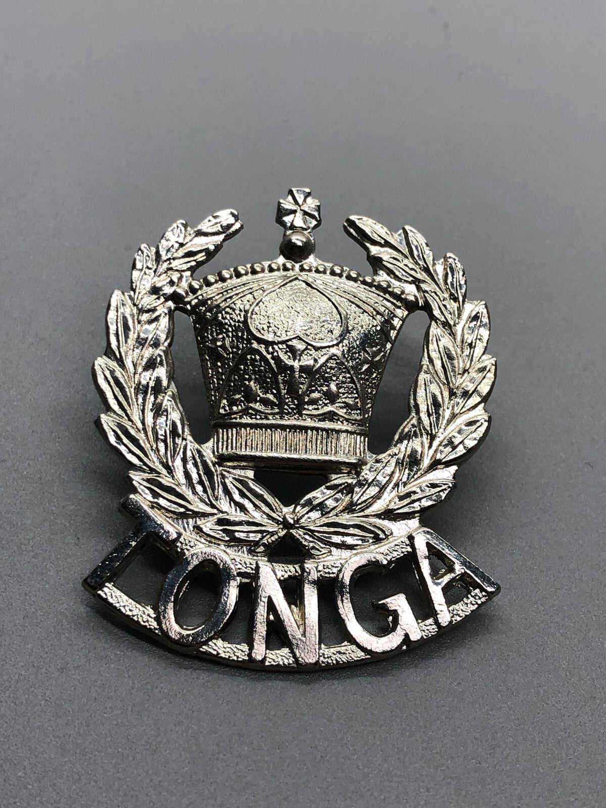 Vintage Tonga Defence Force Cap Badge | For Sale | The Militaria Shop