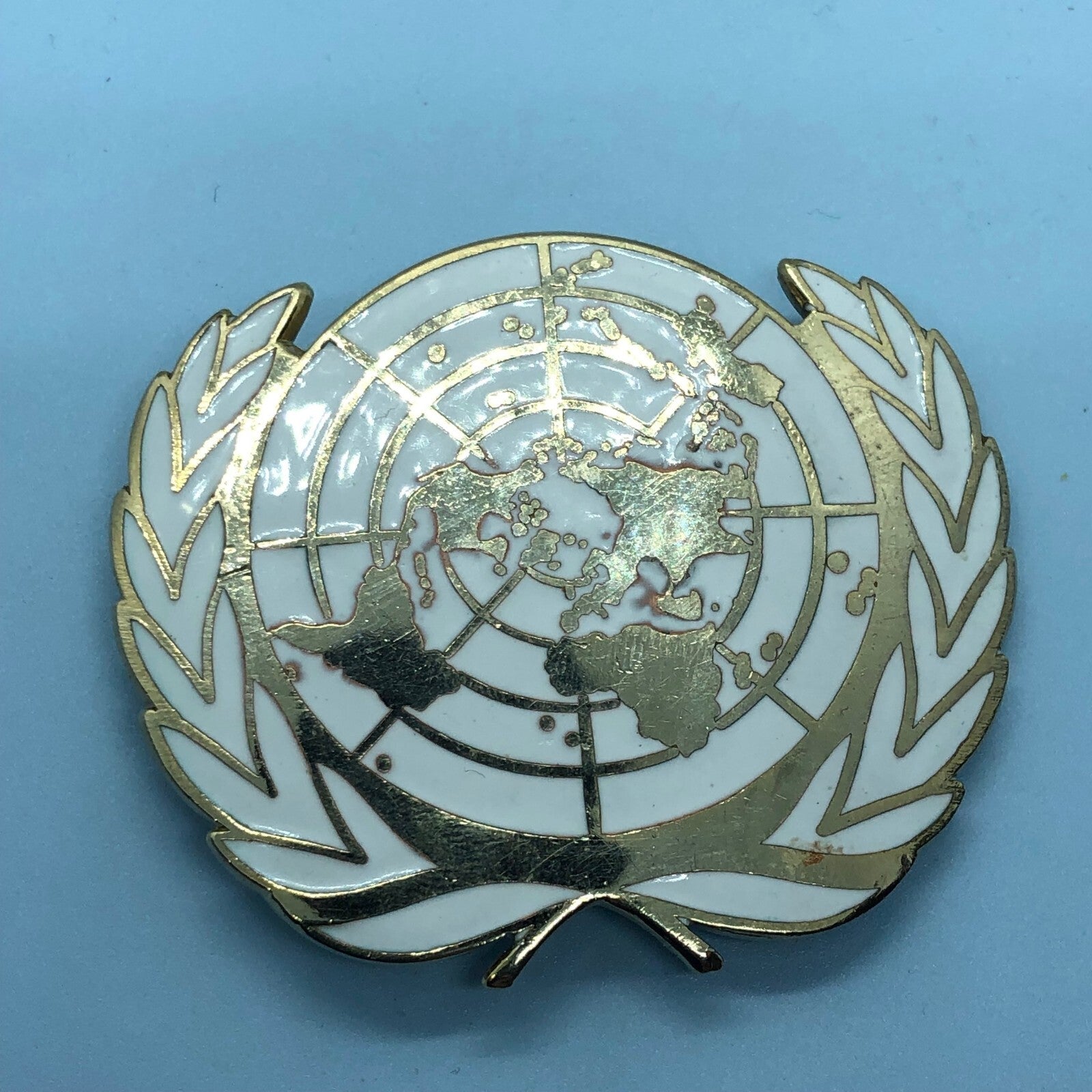 Genuine United Nations Badge | For Sale | The Militaria Shop