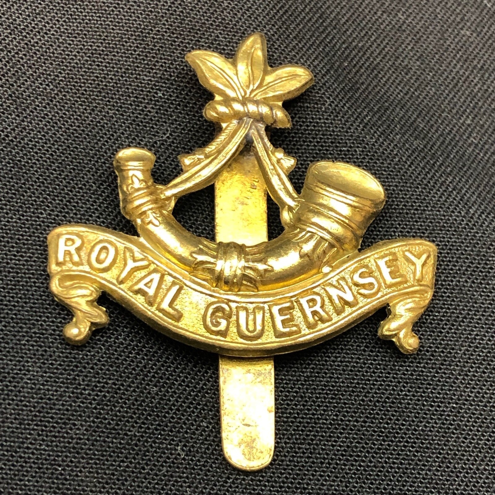Original British Army WW1 Royal Guernsey Light Infantry Cap Badge
